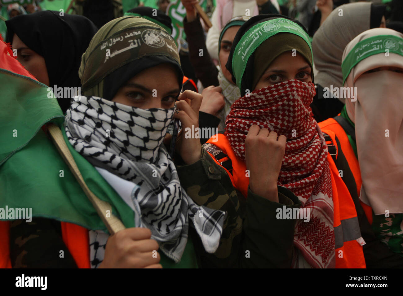 Palestinians take part in a rally marking the 31st anniversary of the ...