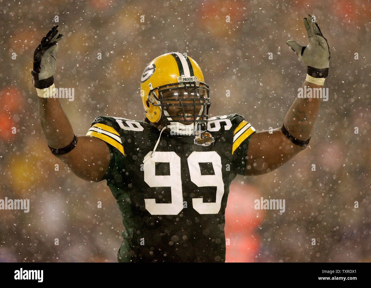 Green Bay Packers defensive tackle Corey Williams (99) celebrates after ...