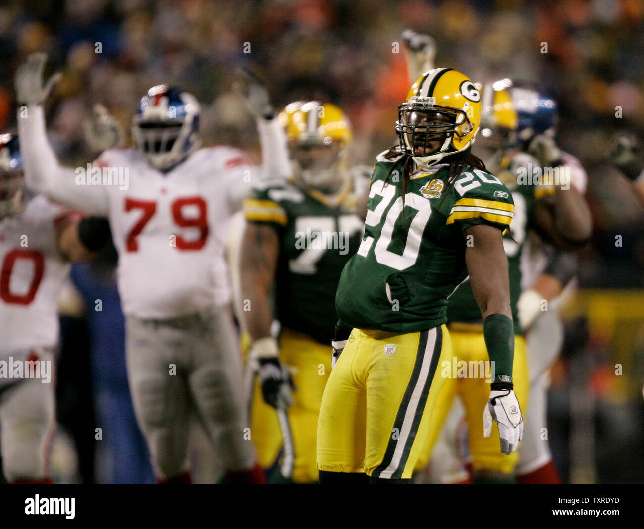 Green Bay Packers' Atari Bigby (20) watches as New York Giants kicker ...