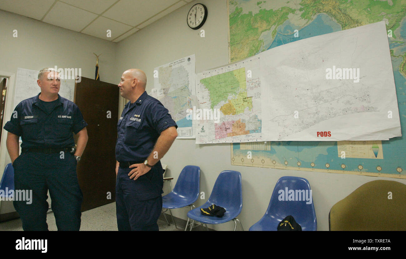 United States Coast Guard Ensign Daniel Donovan (left) of Jacksonville ...
