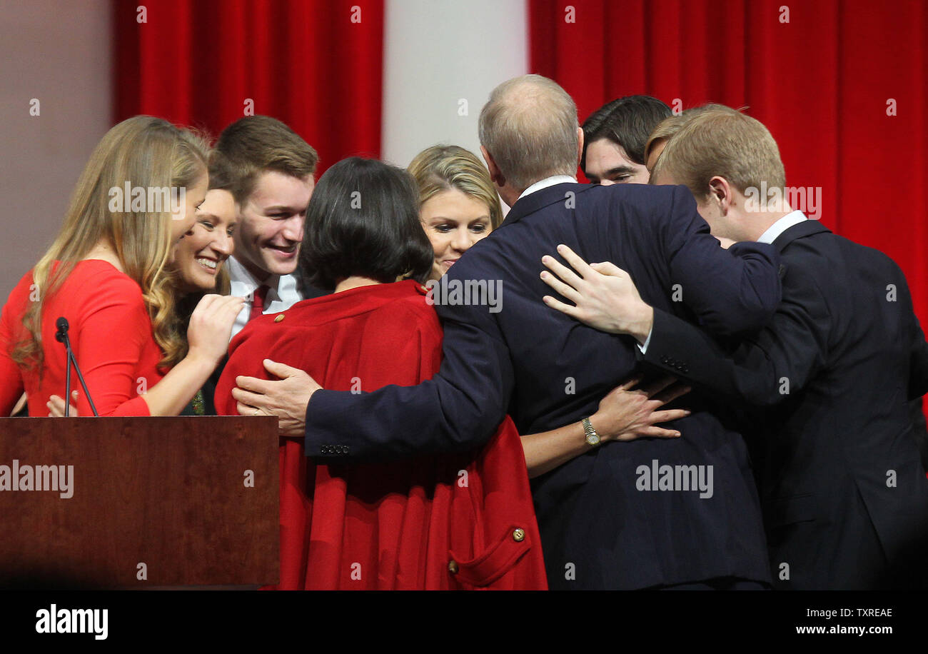 Illinois Governor Bruce Rauner huddles with his family after taking the ...