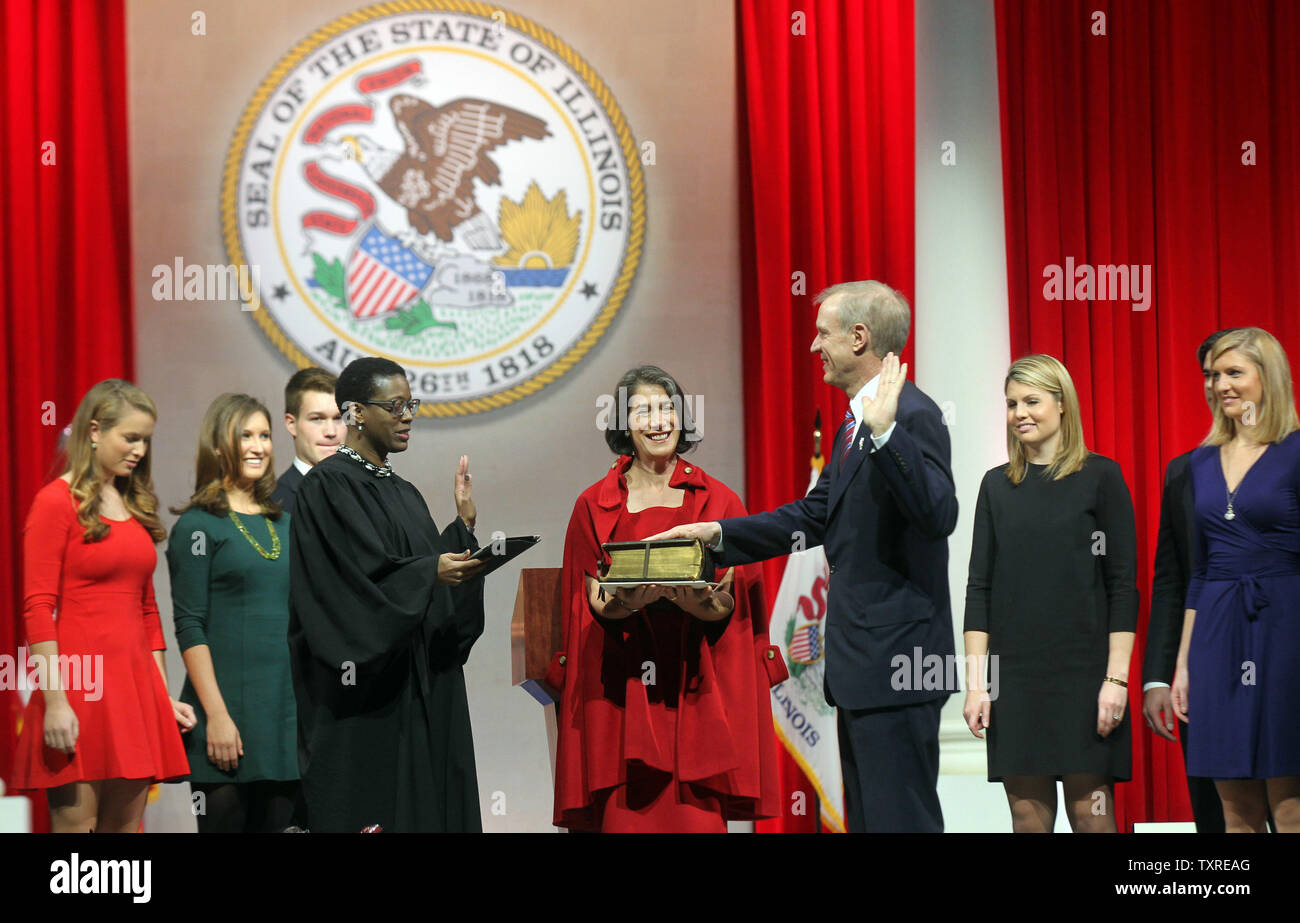 Governor-elect Bruce Rauner takes the oath of office as Governor with ...