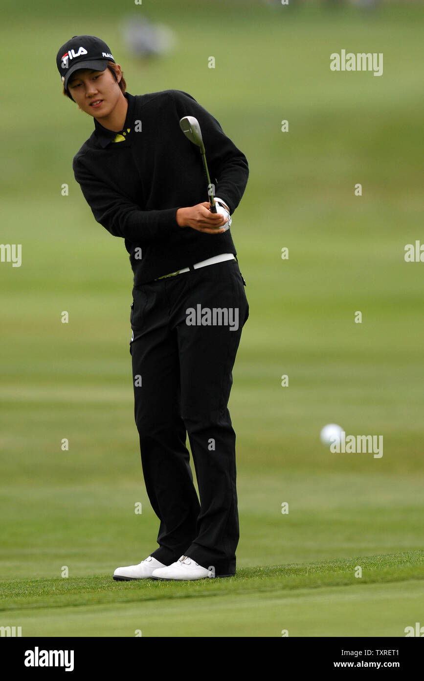 South Korea's Song-Hee Kim chips onto the 14th green in the second ...