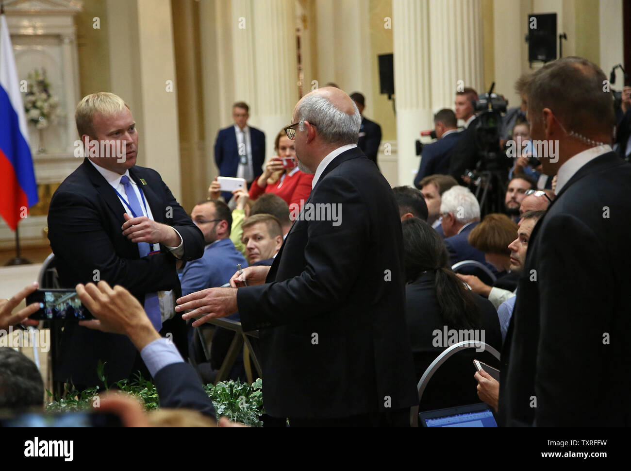 Journalist and activist Sam Husseini is ejected during the joint press ...
