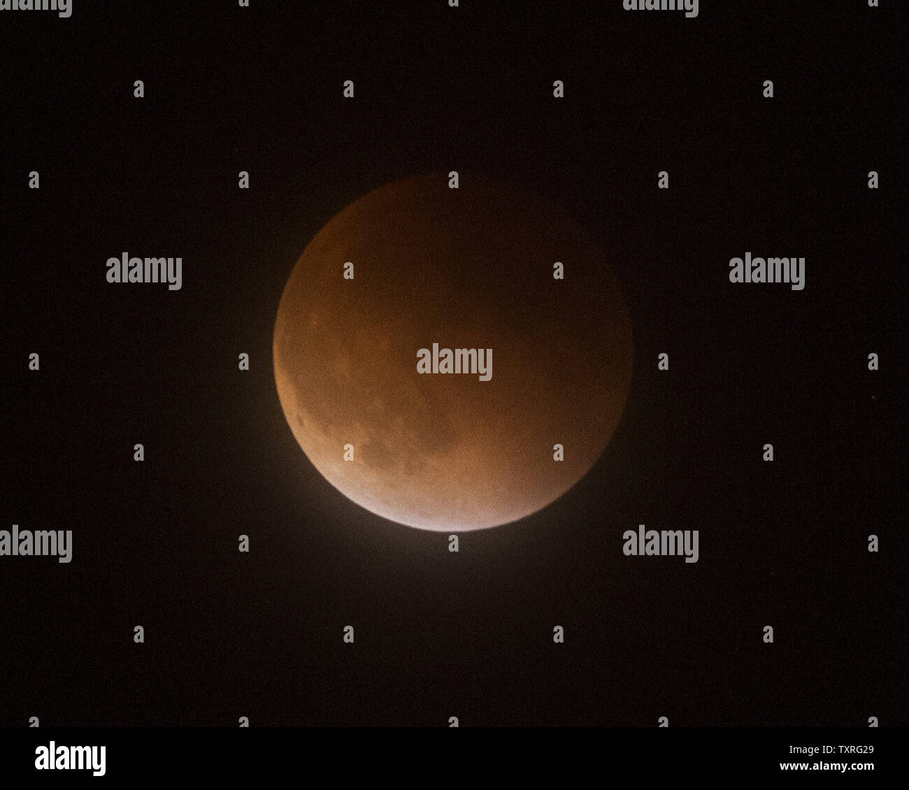 Sun appears larger than the moon hi-res stock photography and images - Alamy