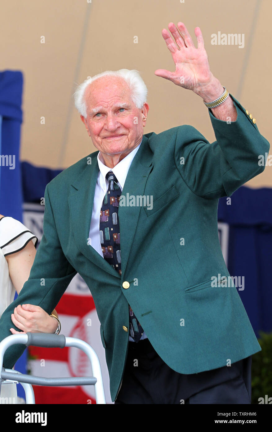National Baseball Hall of Fame member Bobby Doerr is helped onto the ...