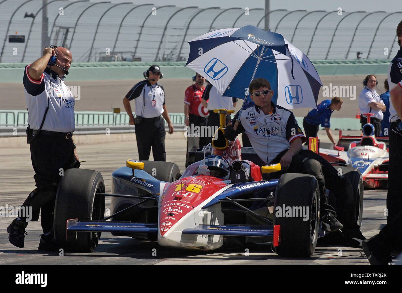 Indy Race Car driver Dana Patrick of Team Rahal waits for the restart ...