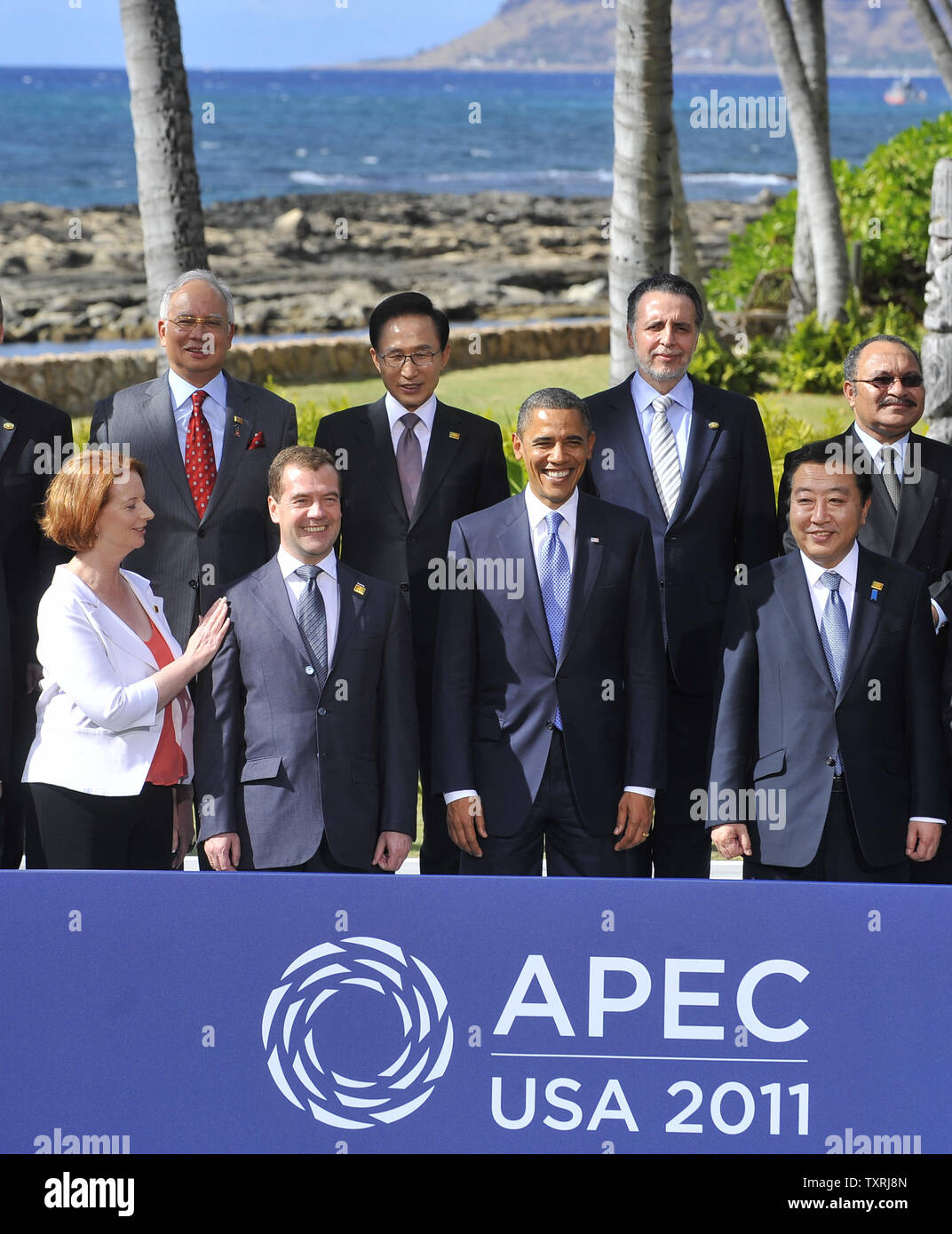 U.S. President Barack Obama takes part in the family photo with state ...