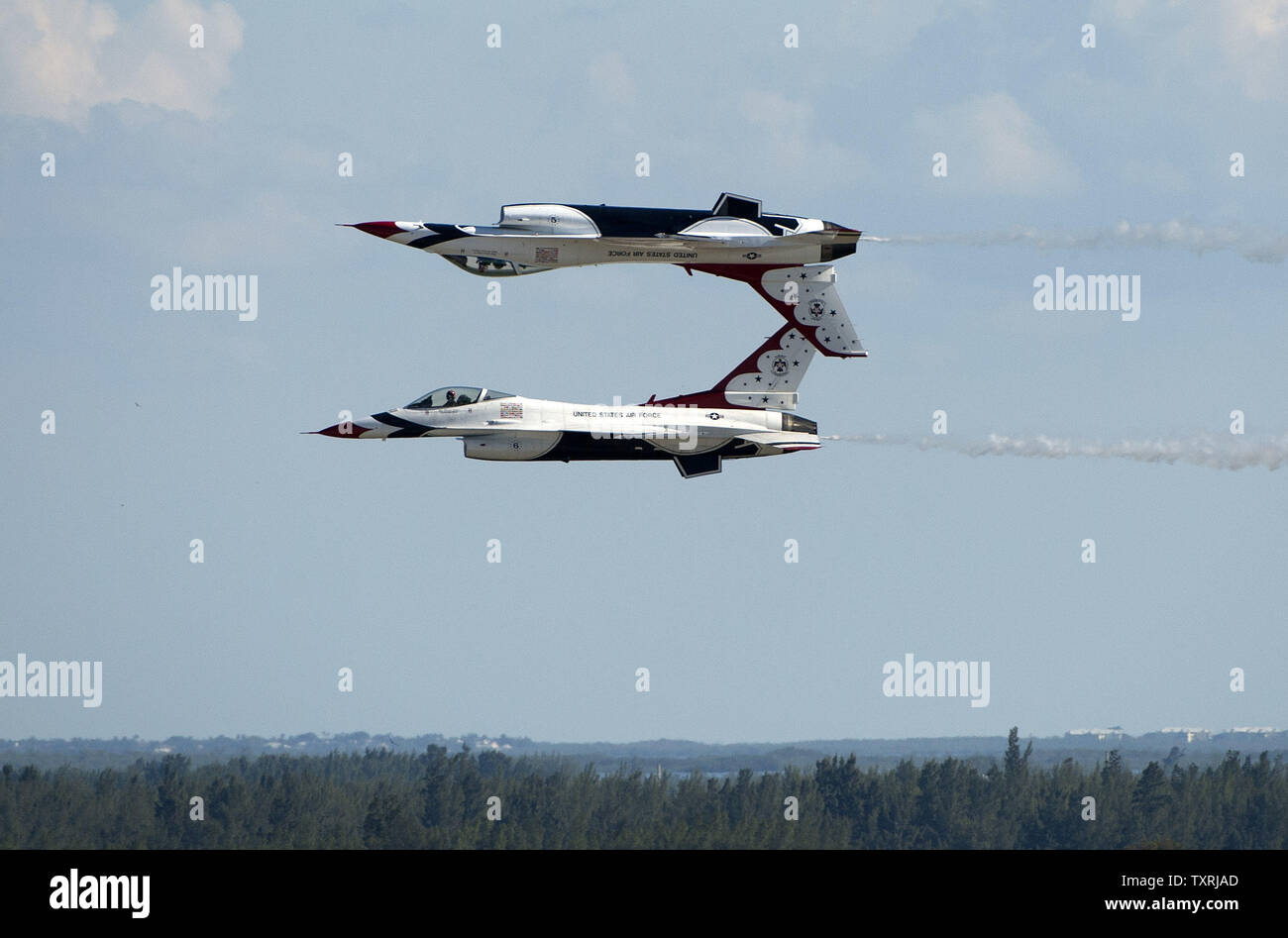 The USAF "Thunderbirds perform aerial maneuvers at the Wings over ...