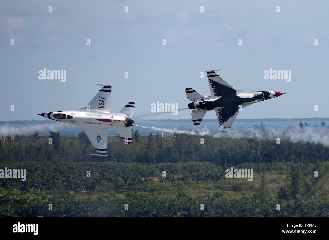 The USAF "Thunderbirds perform aerial maneuvers at the Wings over ...