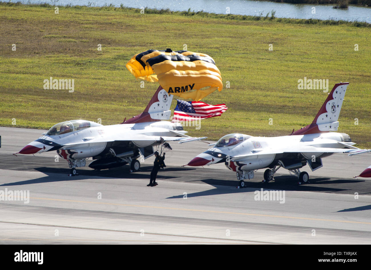 The US Army "Golden Knights" Parachute Team opens the show at the Wings ...