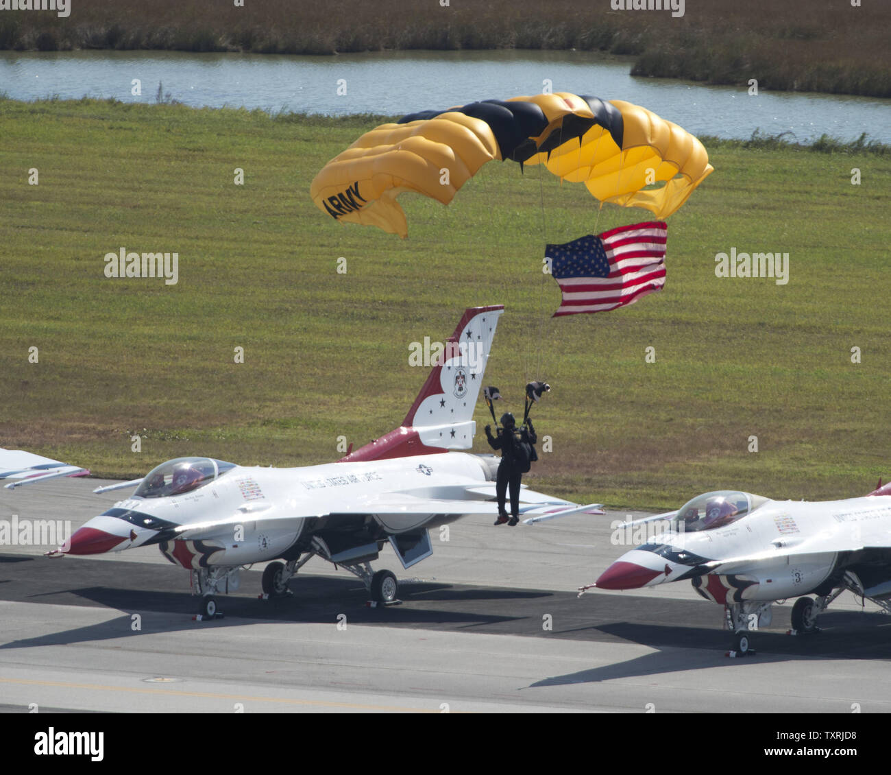 The US Army Golden Knights Parachute Team performs at the Homestead Air ...
