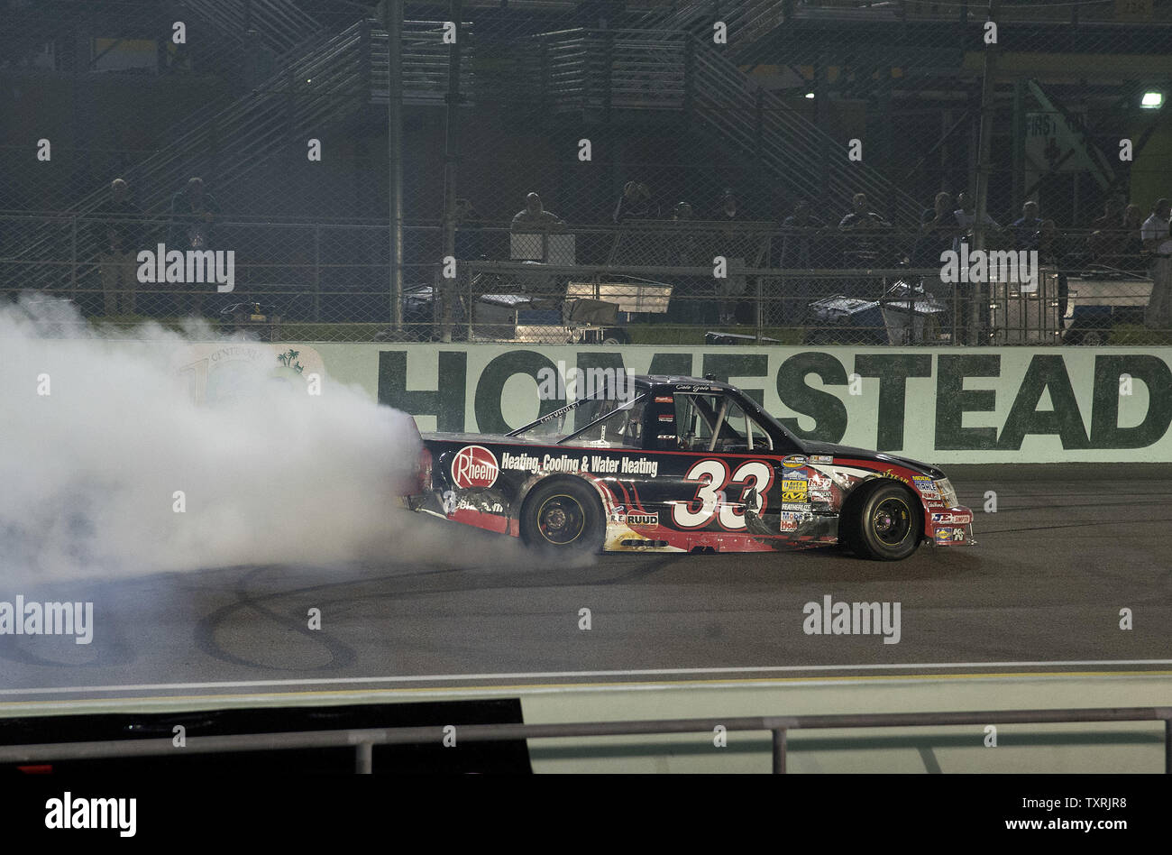 NASCAR driver, Cale Gale, performs the traditional "burn out" after ...