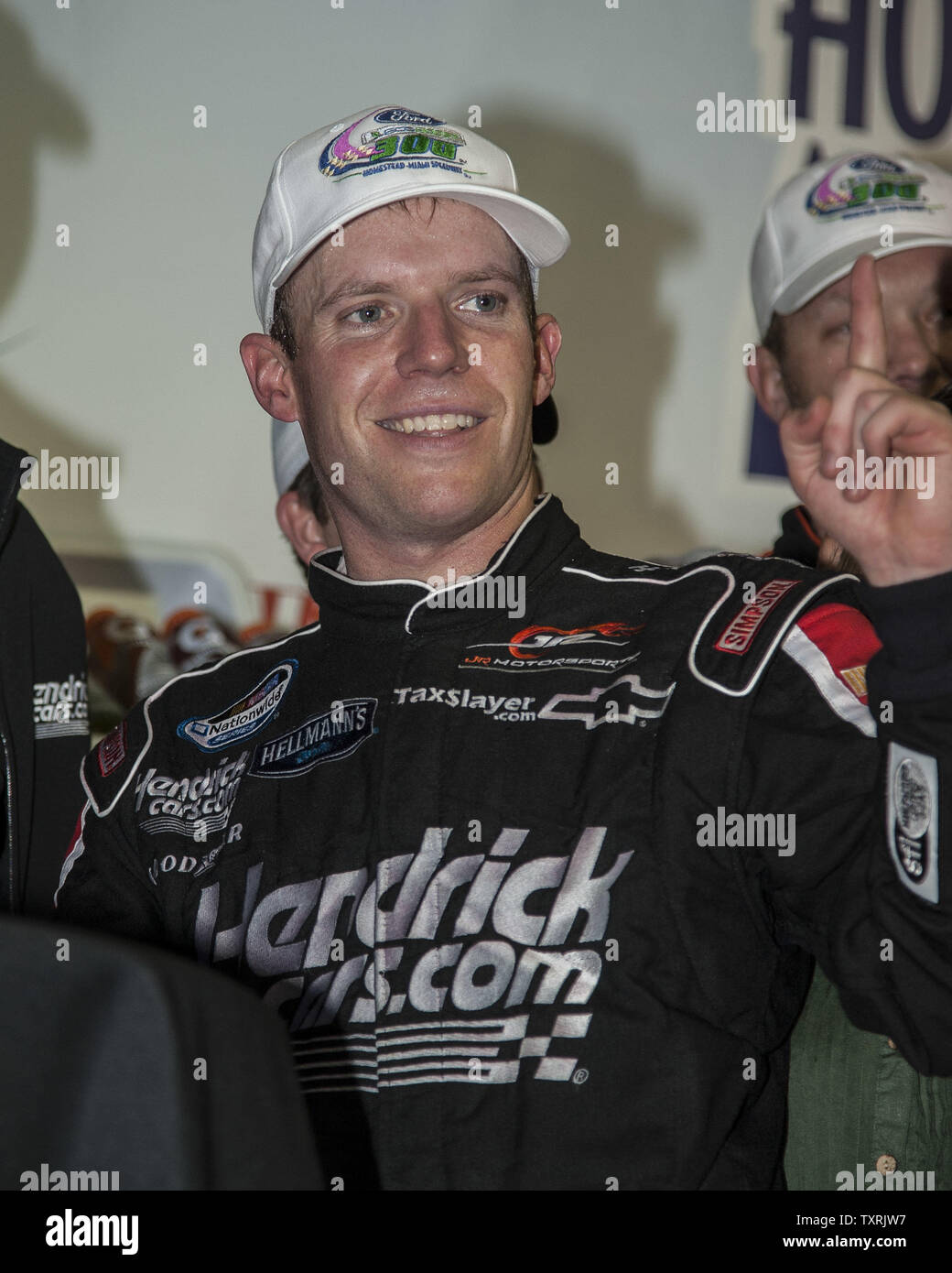 NASCAR racer, Regan Smith, driver of Team Hendrickcars.com Chevrolet ...