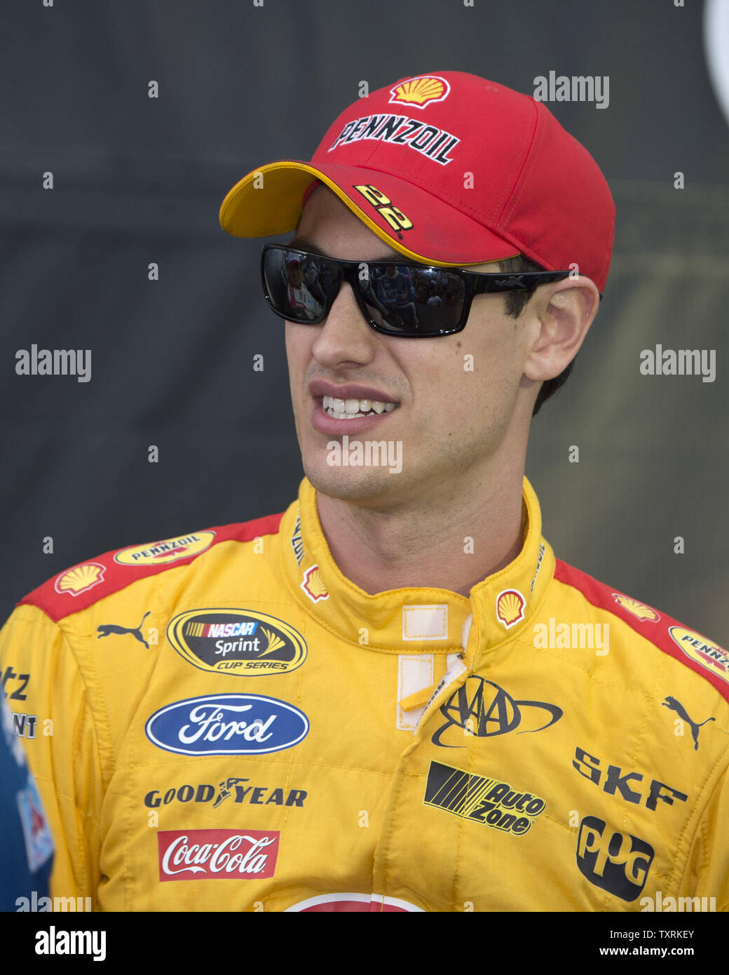 Racer Joey Logano is introduced to the spectators at the 2015 NASCAR ...