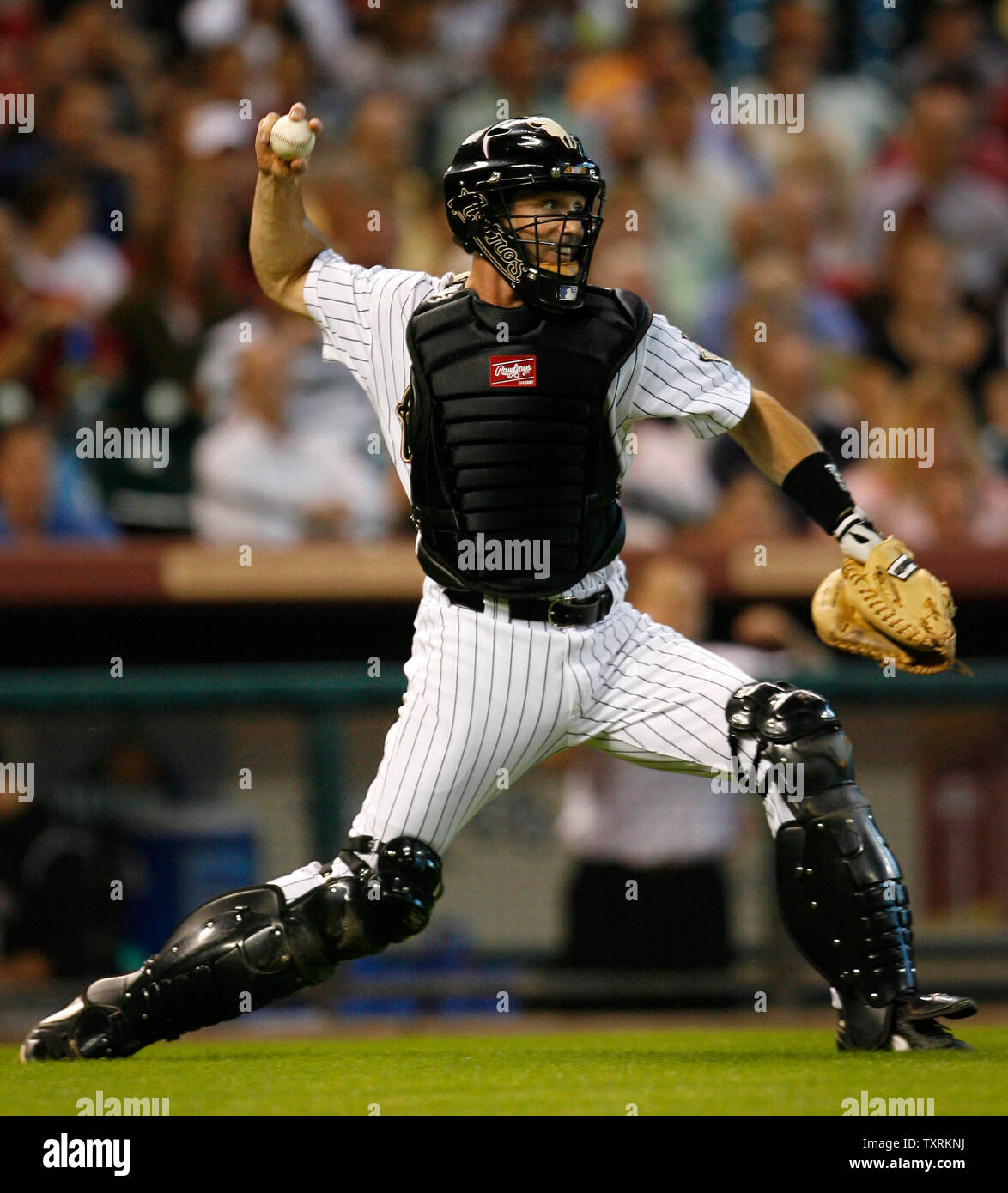 Houston Astros catcher Brad Ausmus throws to second base in the third ...