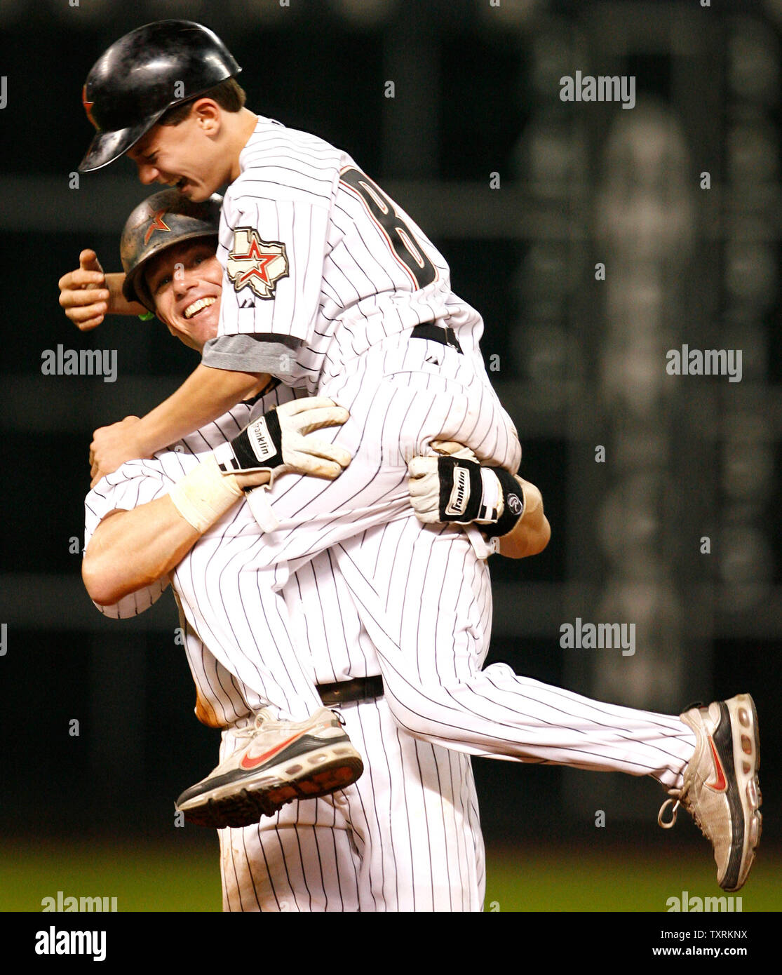 Celebrating a hit hi-res stock photography and images - Alamy