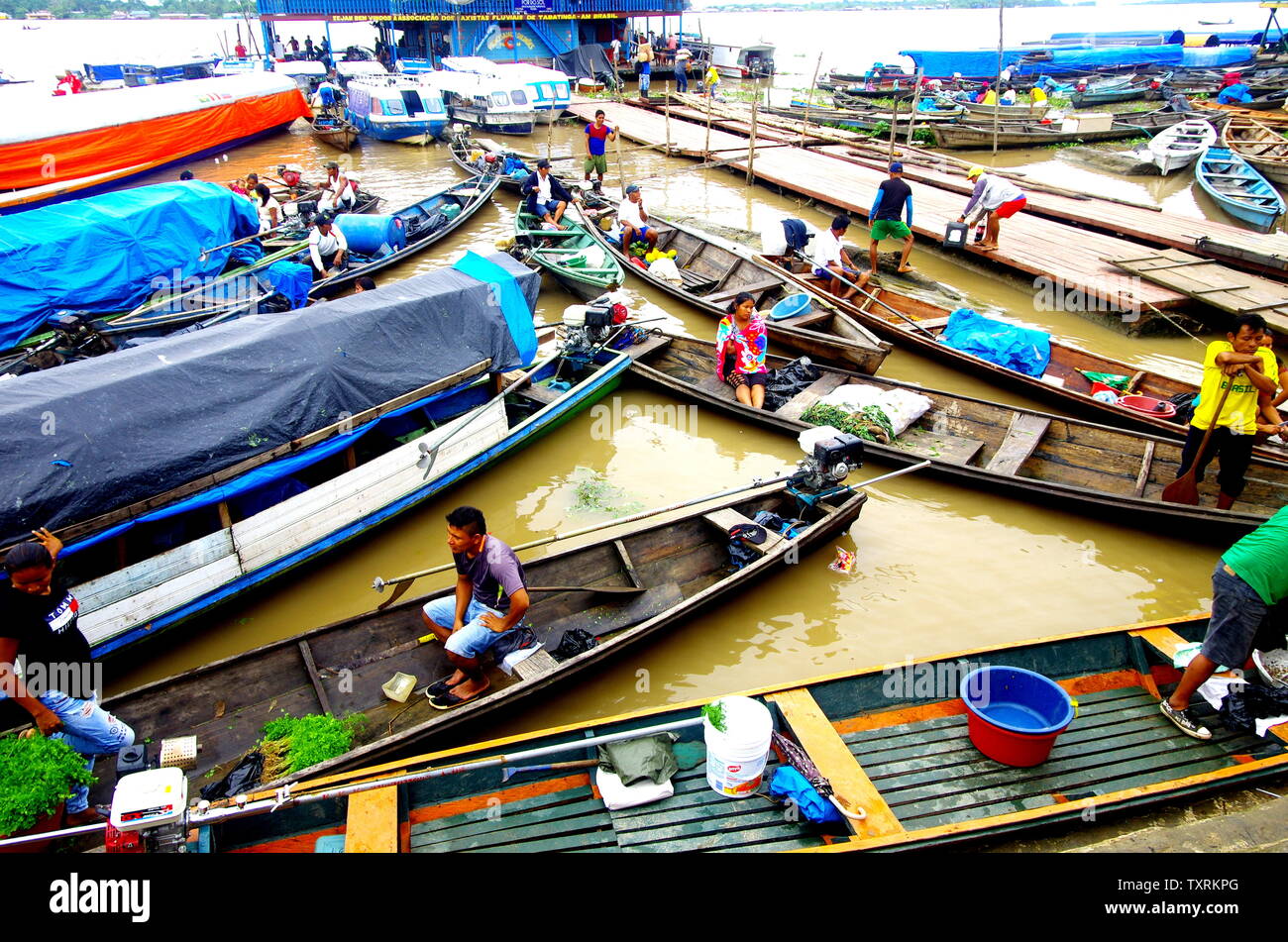 Boats docked on the Amazon river in Colombia Stock Photo - Alamy