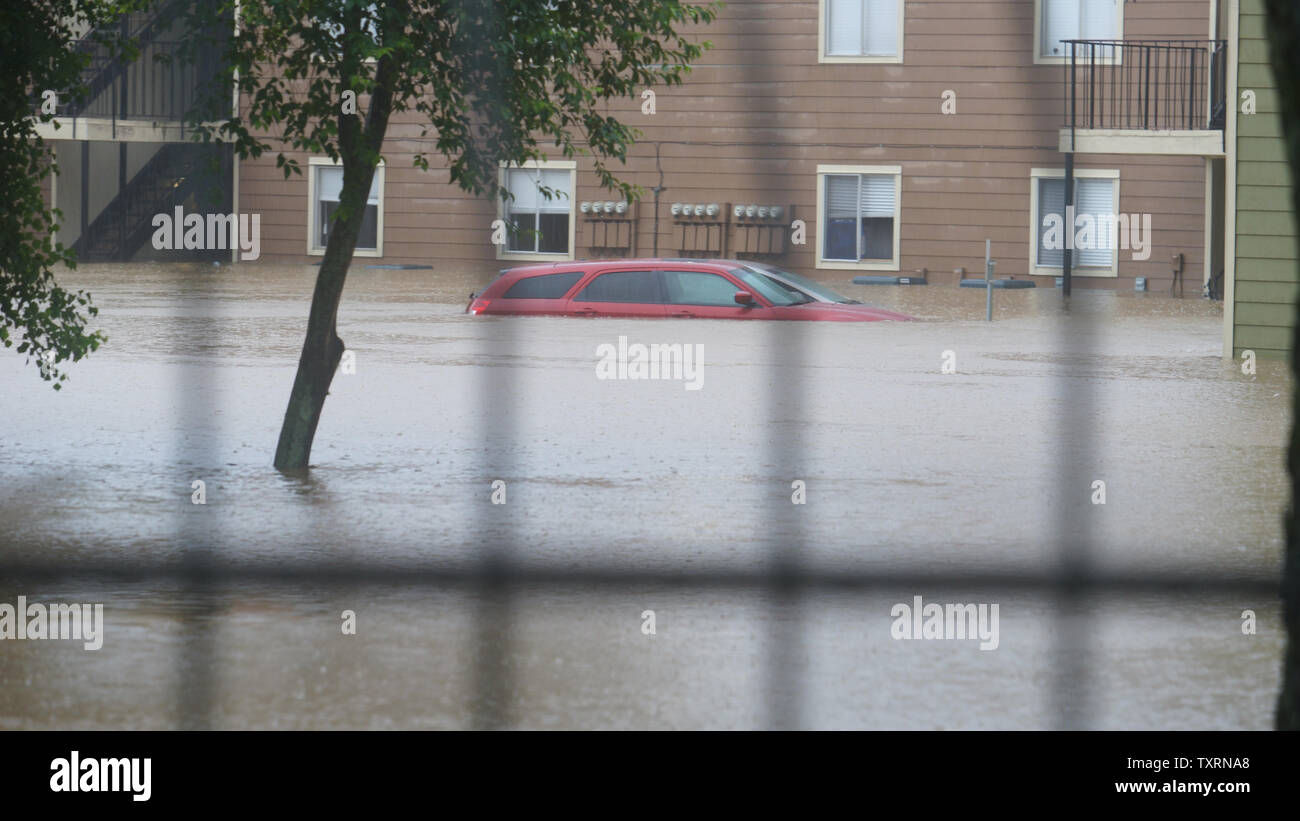 A car is submerged in floodwaters in the Greenspoint area, as Hurricane ...