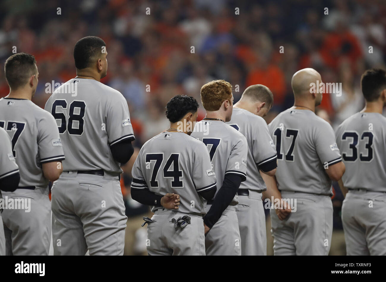 New York Yankees stand for the National Anthem Game 1 of the ALCS at ...