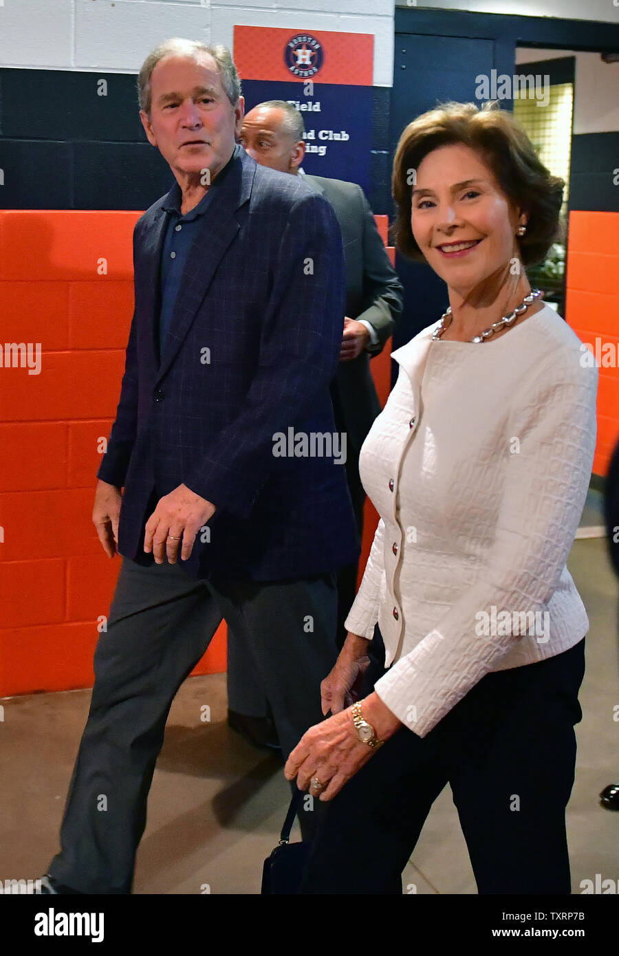 Former President George W. Bush and his wife Laura arrive for the first ...