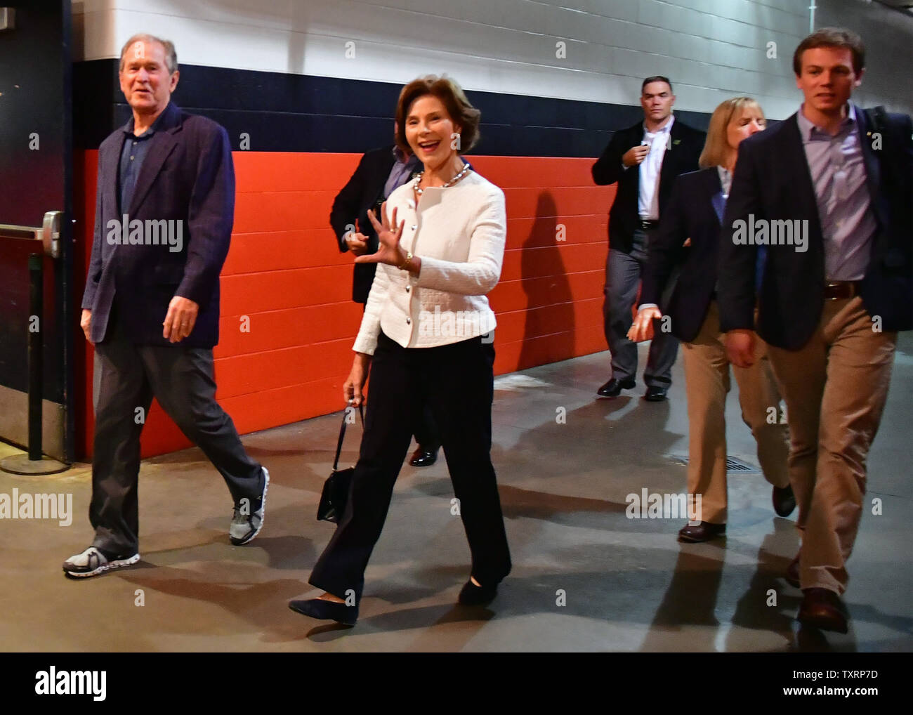 Former President George W. Bush and his wife Laura arrive for the first ...