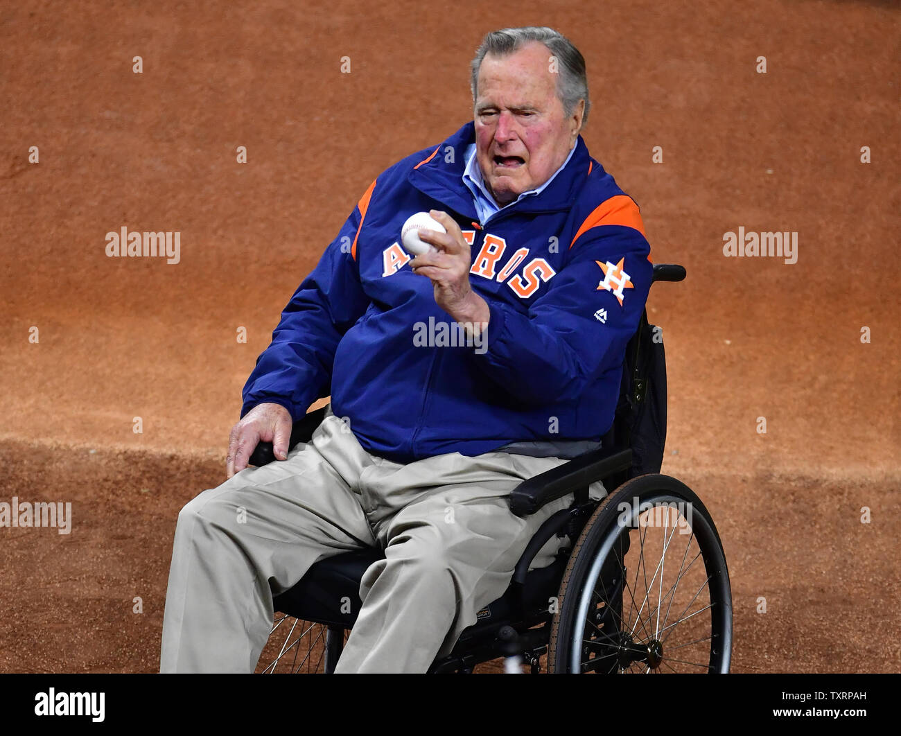 Former U.S. Presidents George W. Bush and George H.W. Bush throw out ...