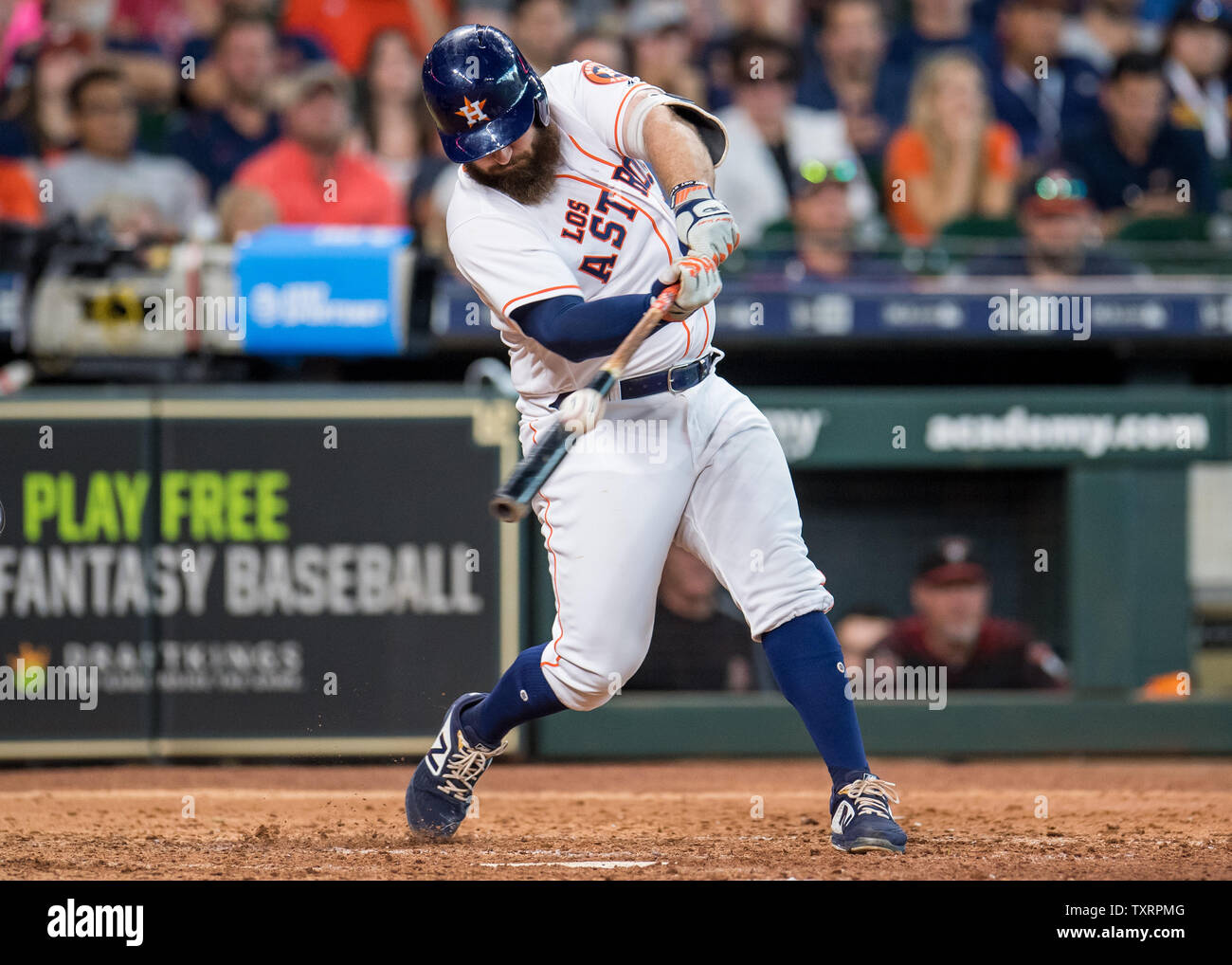 Tyler White of the Houston Astros hits an RBI double against the ...
