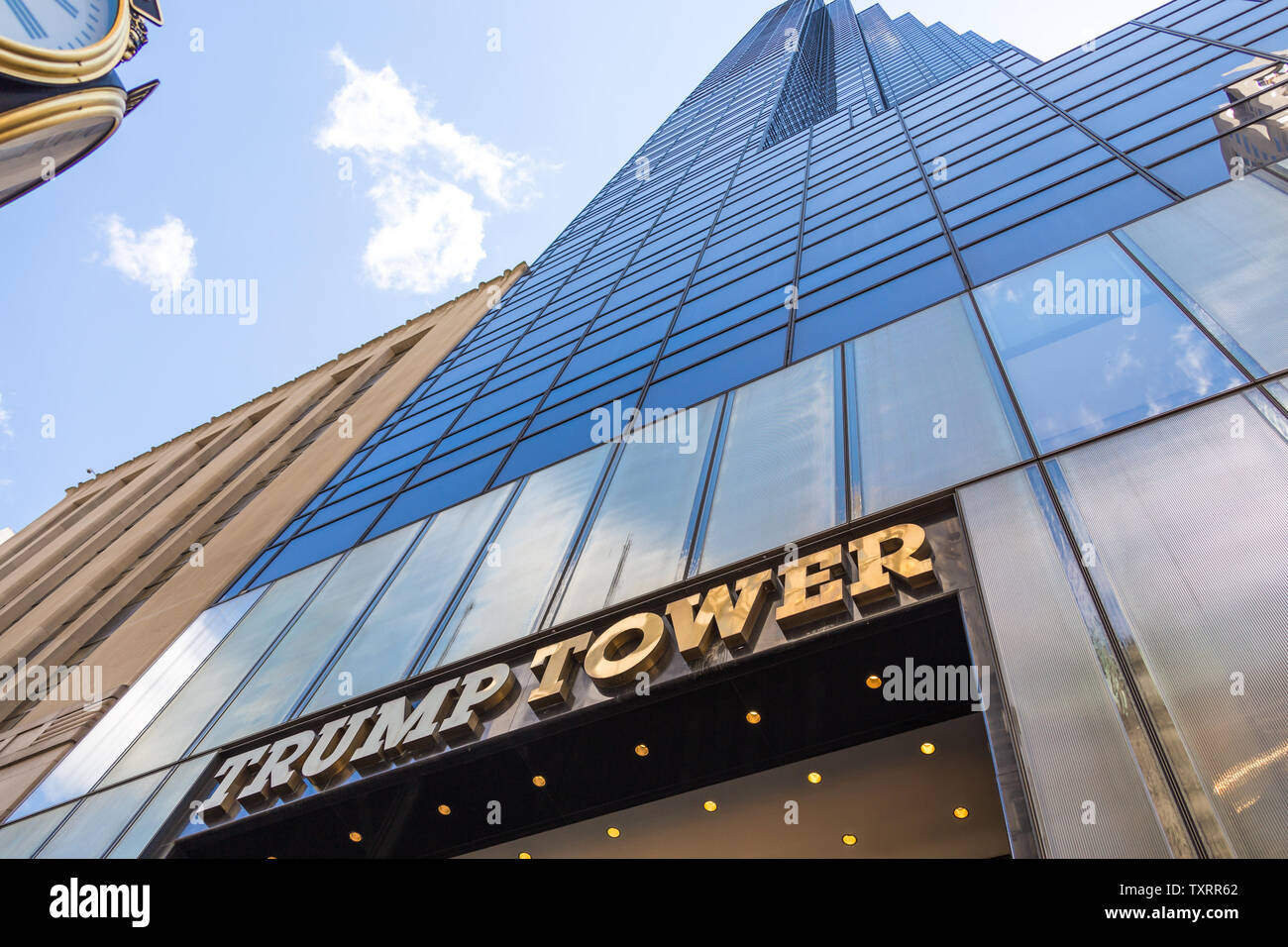 NEW YORK, USA - MAY 15, 2019: Low angle of the gold facade of Trump ...