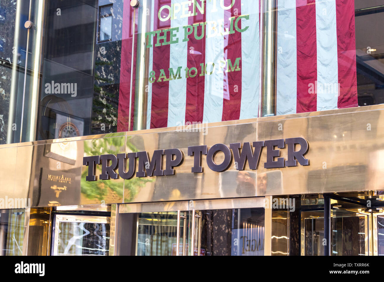 NEW YORK, USA - MAY 15, 2019: Low angle of the gold facade of Trump ...