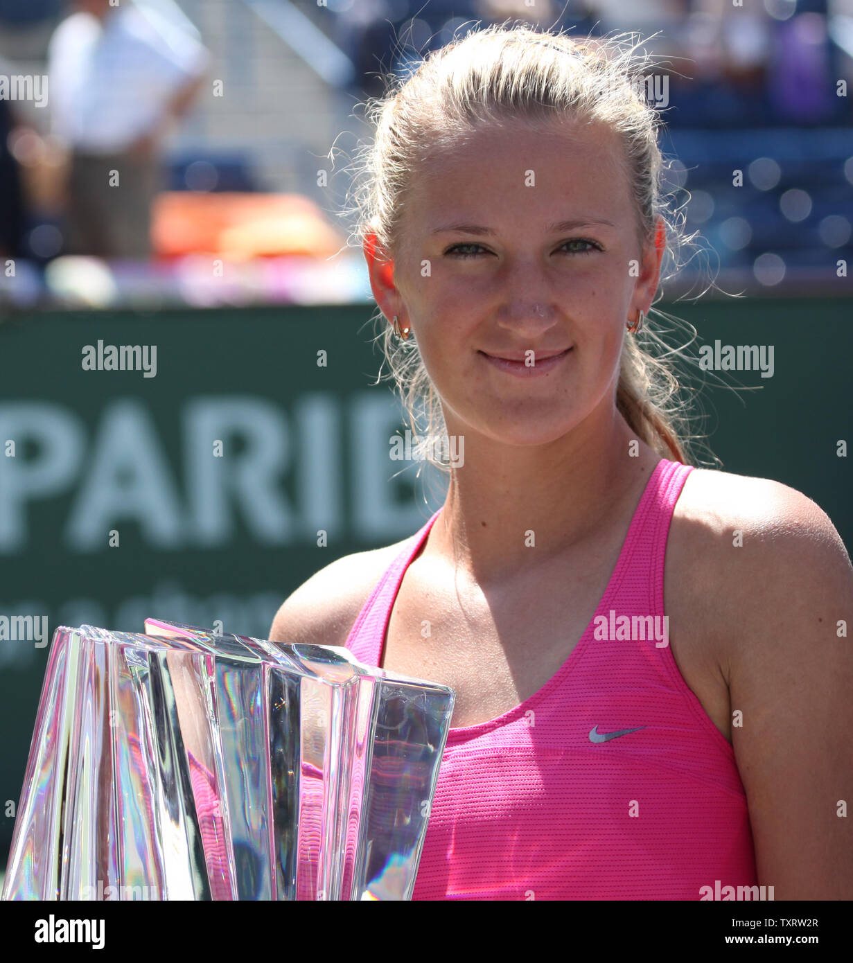 Victoria Azarenka of Belarus holds the championship trophy after ...