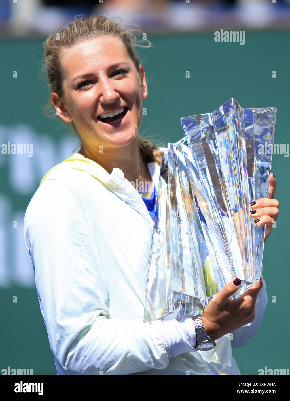 Victoria Azarenka of Belarus holds the championship trophy after ...