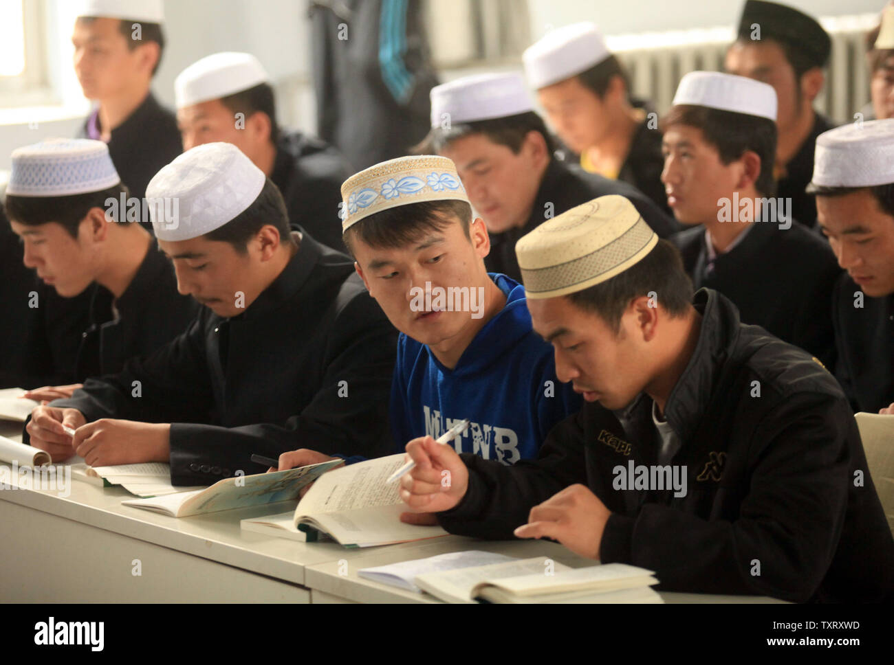 Both Han and ethnic minority Hui Chinese students attend the Ningxia ...