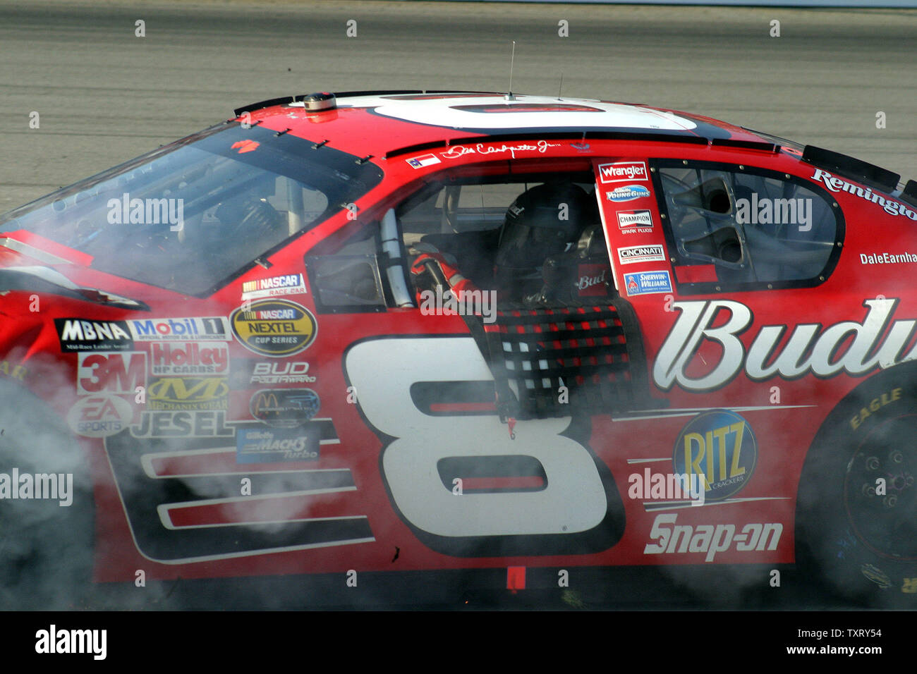 Dale Earnhardt Jr.'s car smokes after hitting Mark Martin at the end of ...