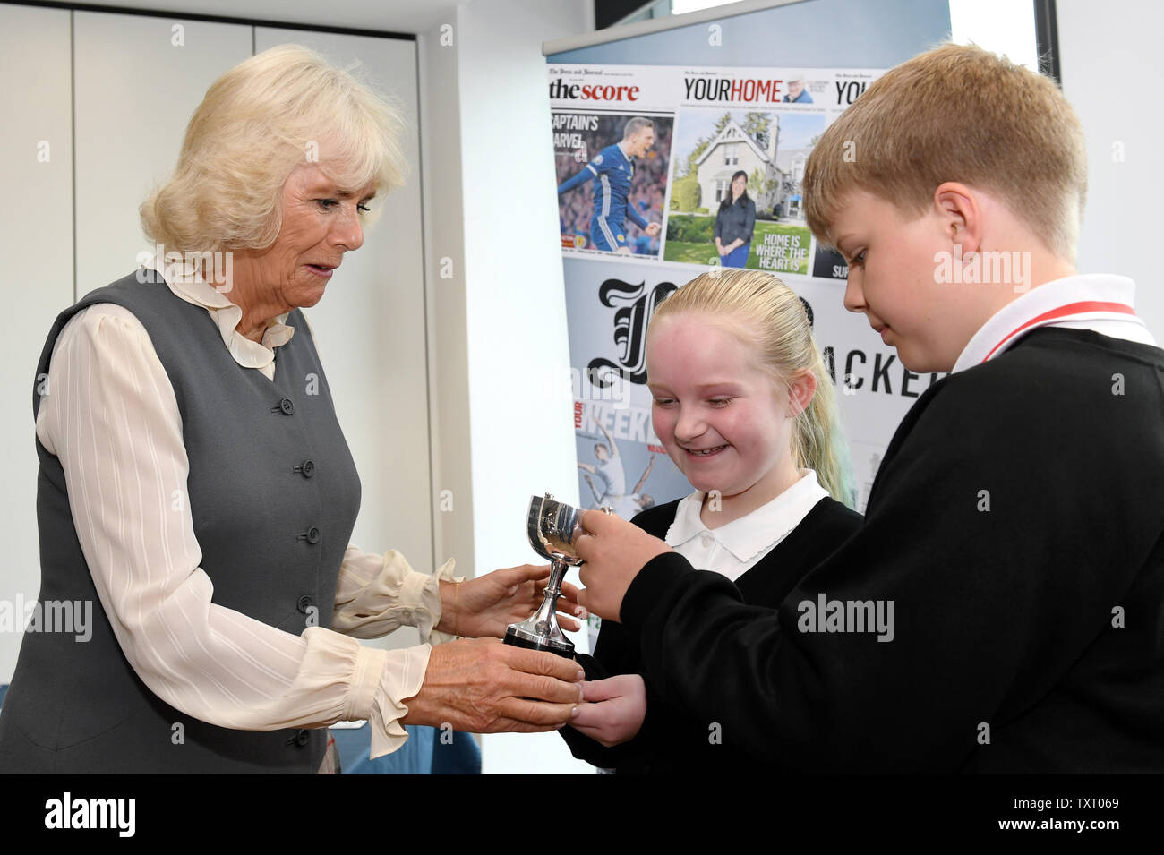 The Duchess of Rothesay presenting the winning trophy to junior ...