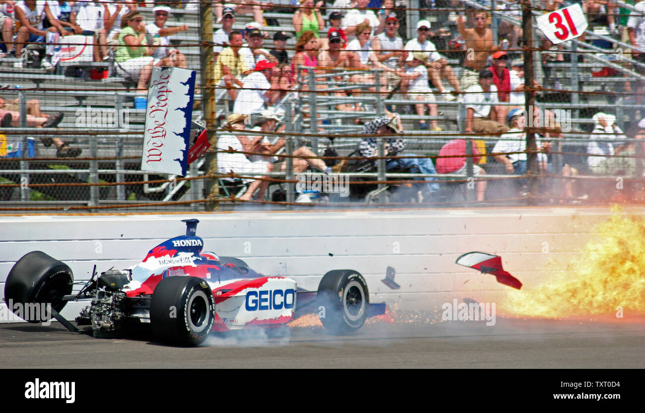 Al Unser Jr. crashes into the wall during the 90th running of the ...
