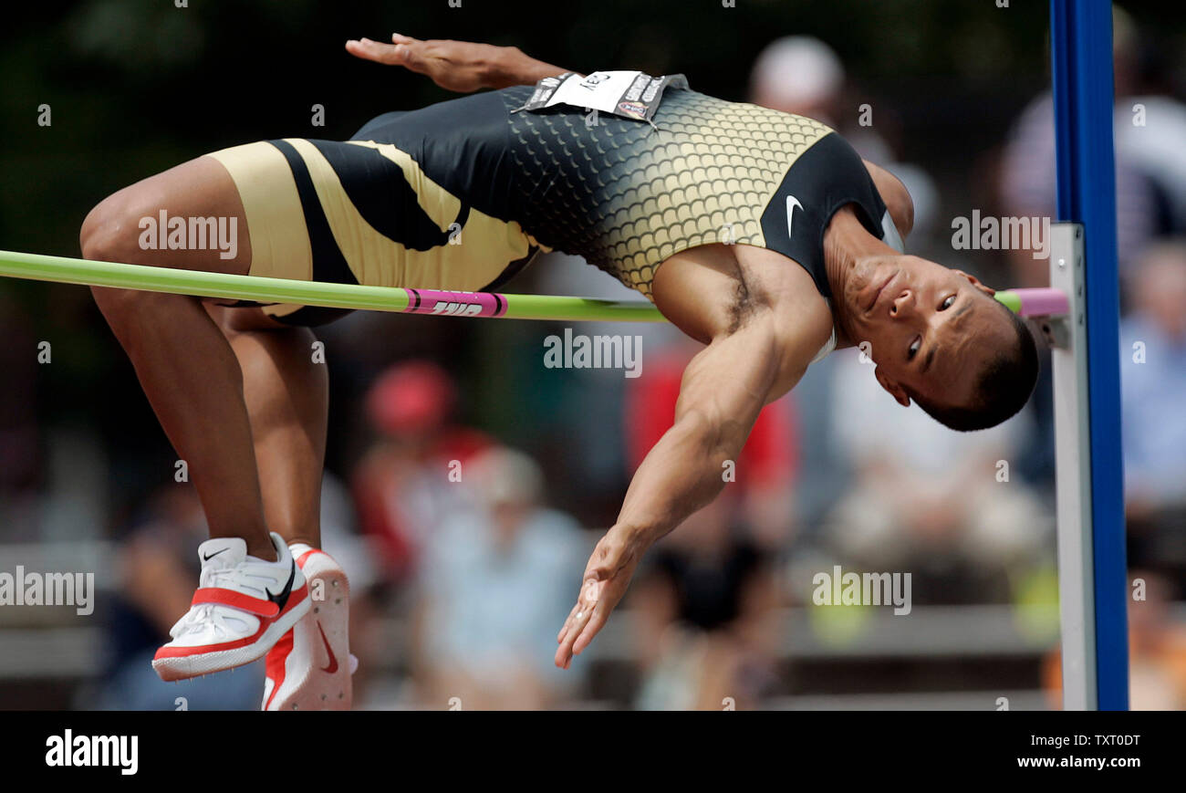 Bryan Clay from team Nike clears the high jump bar to take the lead in ...