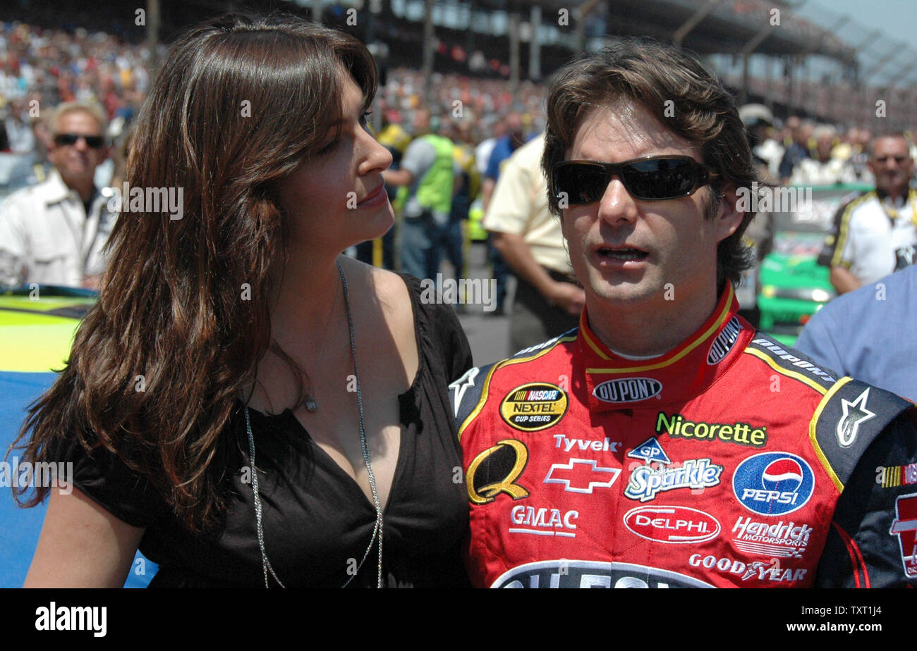 Jeff Gordon and his wife Ingrid Vandebosch stand on the on the track ...