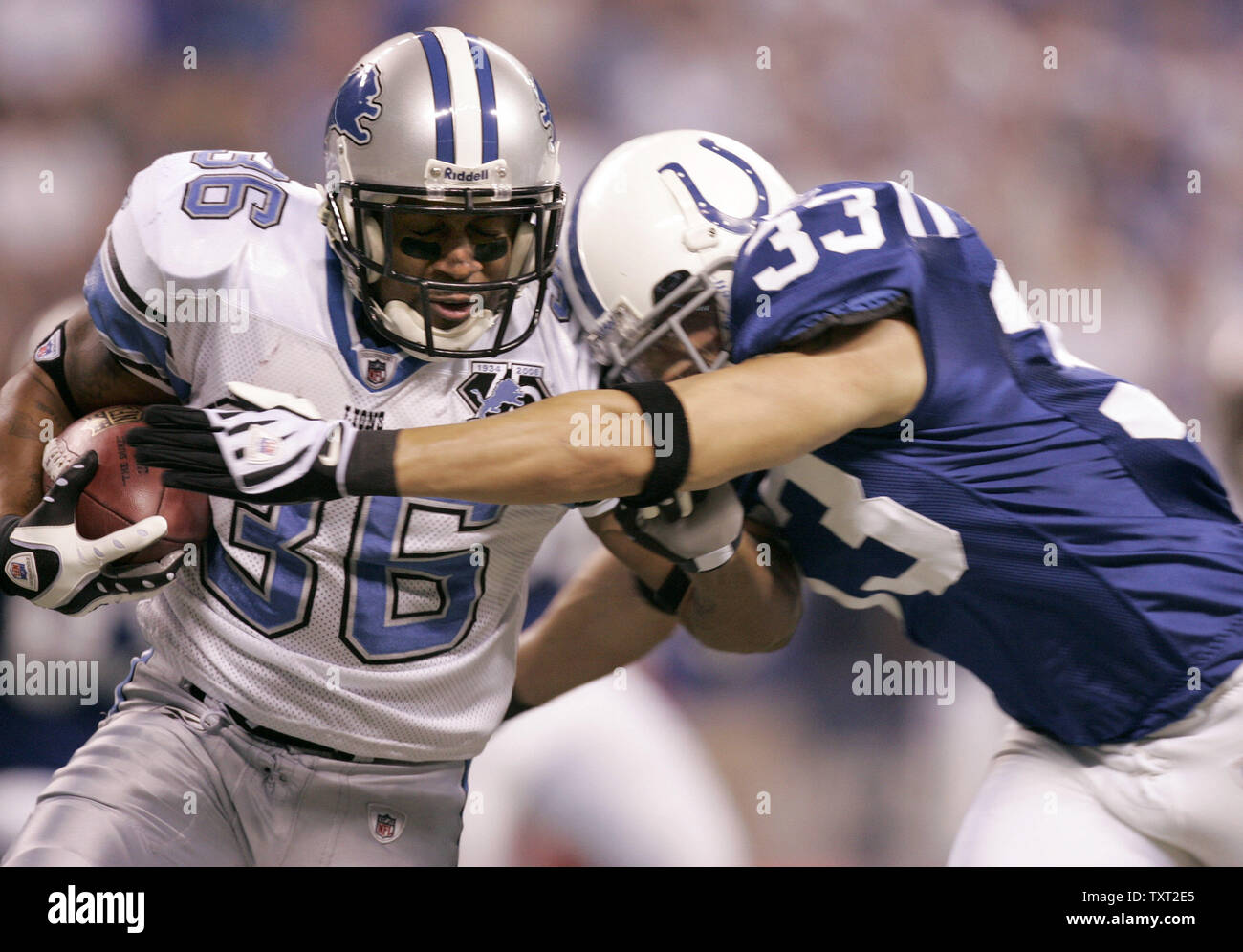 Detroit Lions running back Aveion Cason (36) is hit by Indianapolis ...