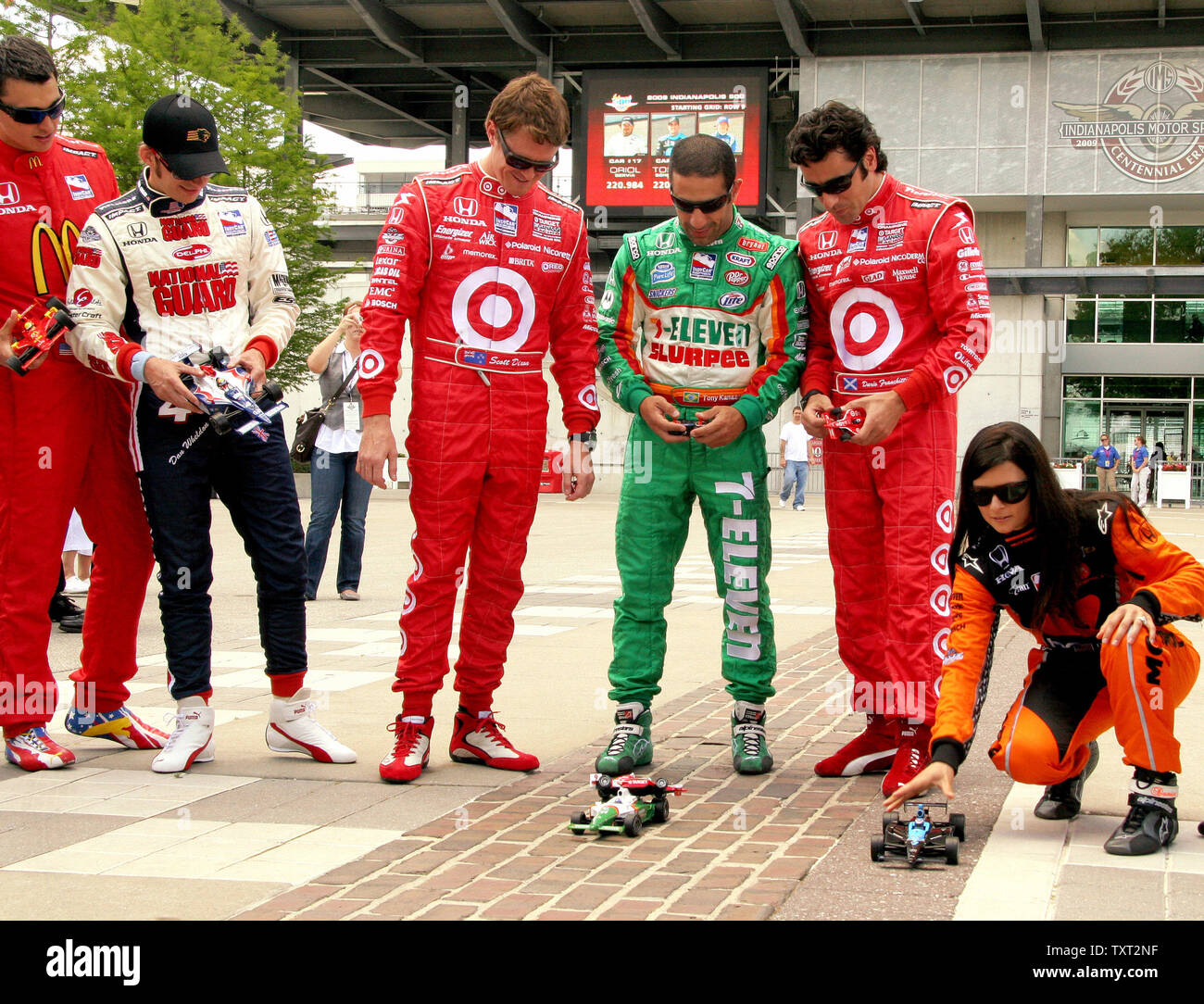 Indy drivers (left to right) Graham Rahal, Dan Weldon, Scott Dixon ...
