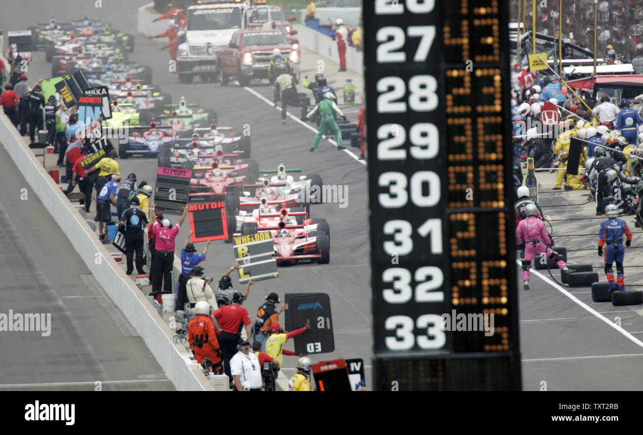 The field pits after a crash in turn one of the 93nd running of the ...