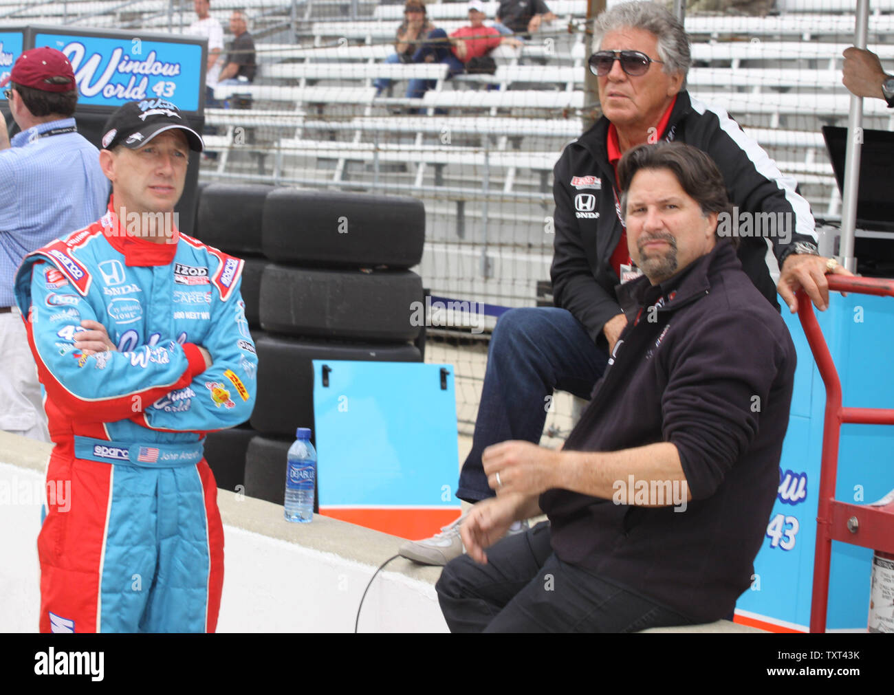 The famous Andretti clan, John, Mario and Michael confer with each ...