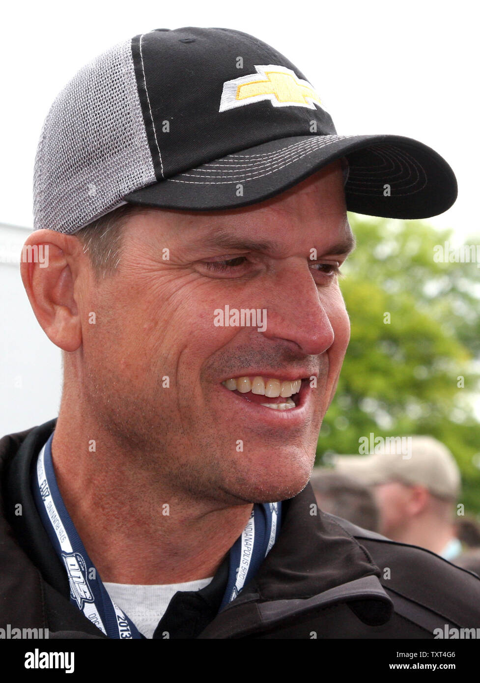 Pace car driver San Francisco 49ers coach Jim Harbaugh talks to the ...