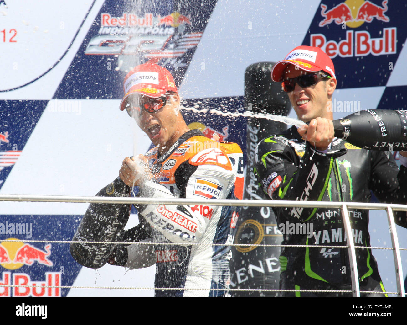 Dani Pedrosa, Repsol Honda Team, gets sprayed by Andrea Dovizioso ...