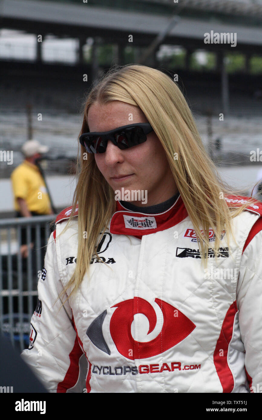 Pippa Mann walks out to her racer to qualify for the 87th Indianapolis ...