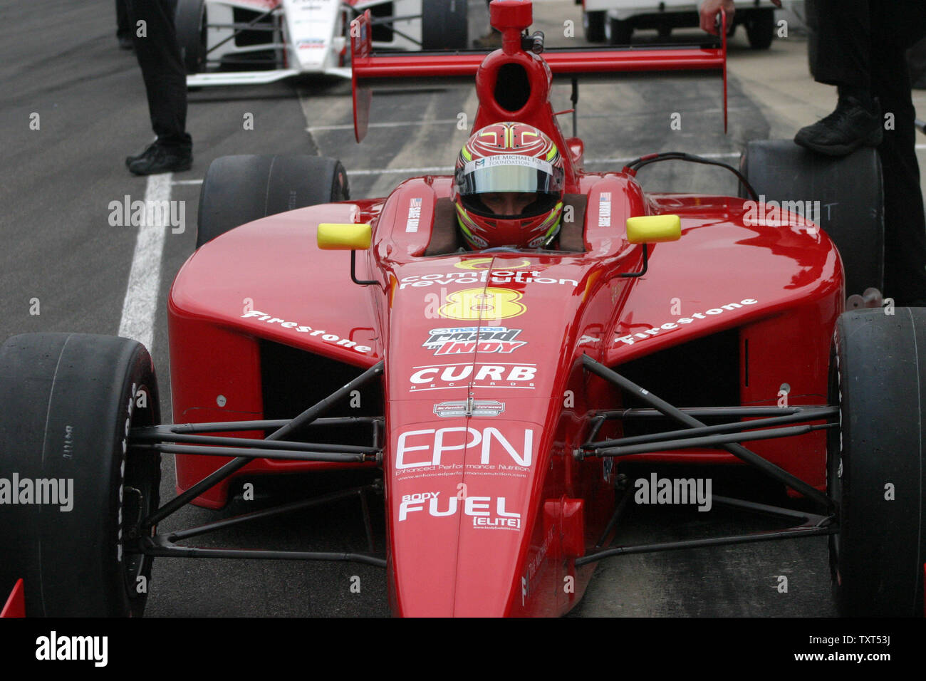 Driver Sage Karam pulls out of the pits to practice for the Freedom 100 ...