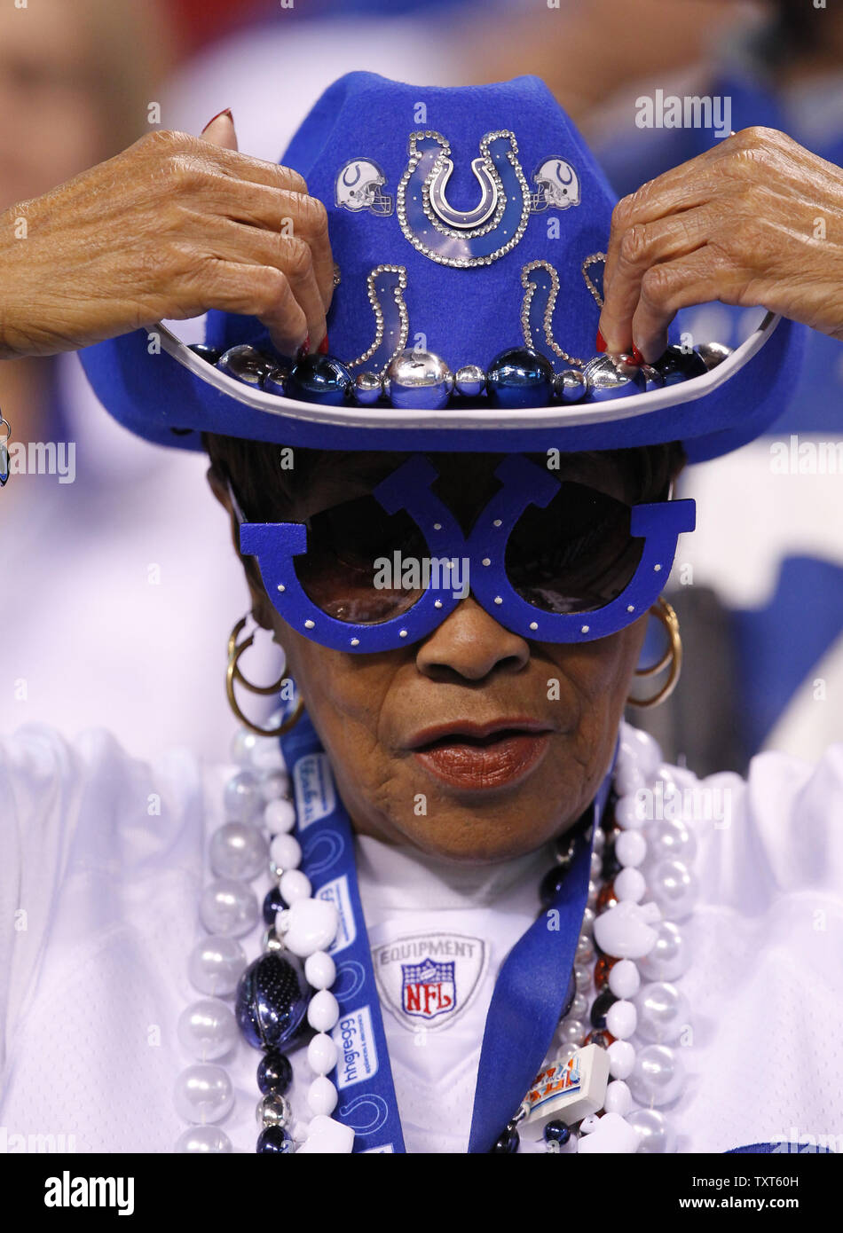 A Indianapolis Colts' fans adjust her had as she get ready for her ...