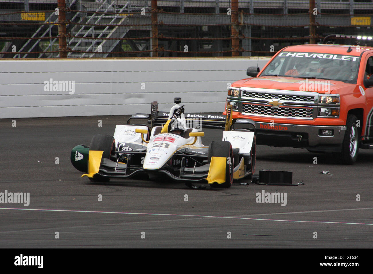 Josef Newgarden waits for help after a first turn, first lap cars took ...