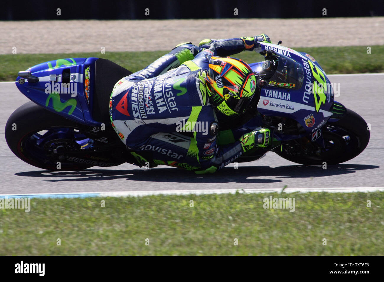 2008 Moto GP winner Valentino Rossi speeds through the treacherous turn ...