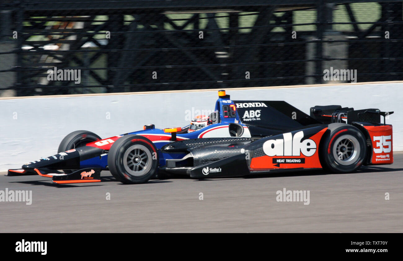 Alex Tagliani exits the north short chute in his repaired car during ...